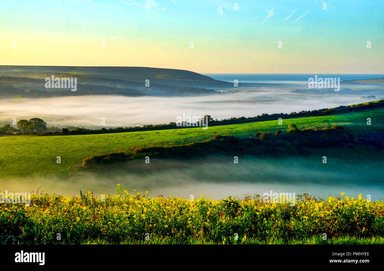 Cuckmere valley, East Sussex, United Kingdom, UK, covered in mist in ...