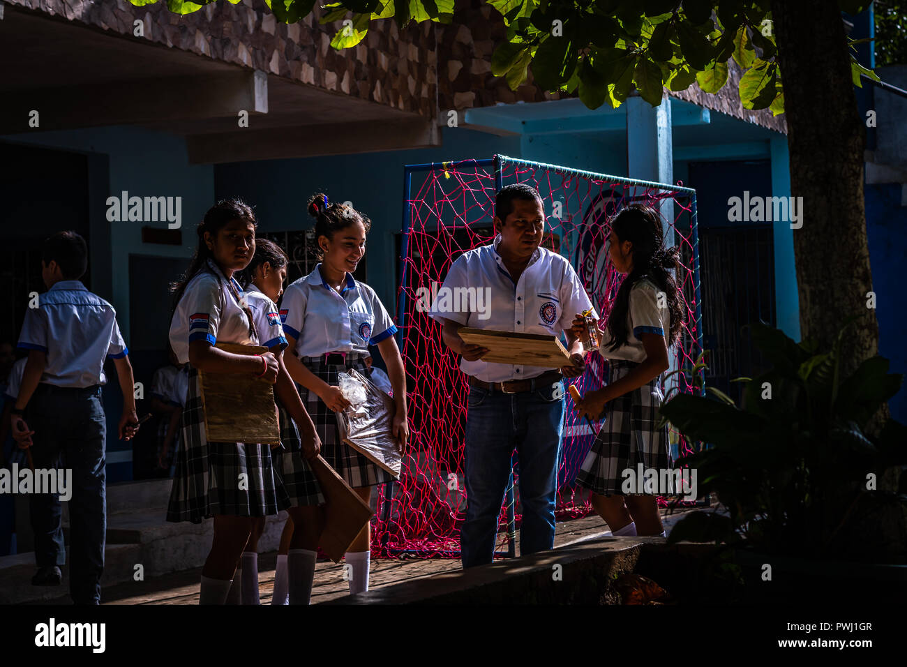 principal with students in college Stock Photo - Alamy