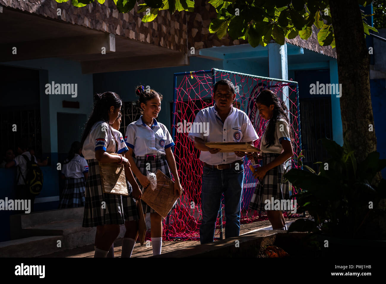 principal with students in college Stock Photo - Alamy