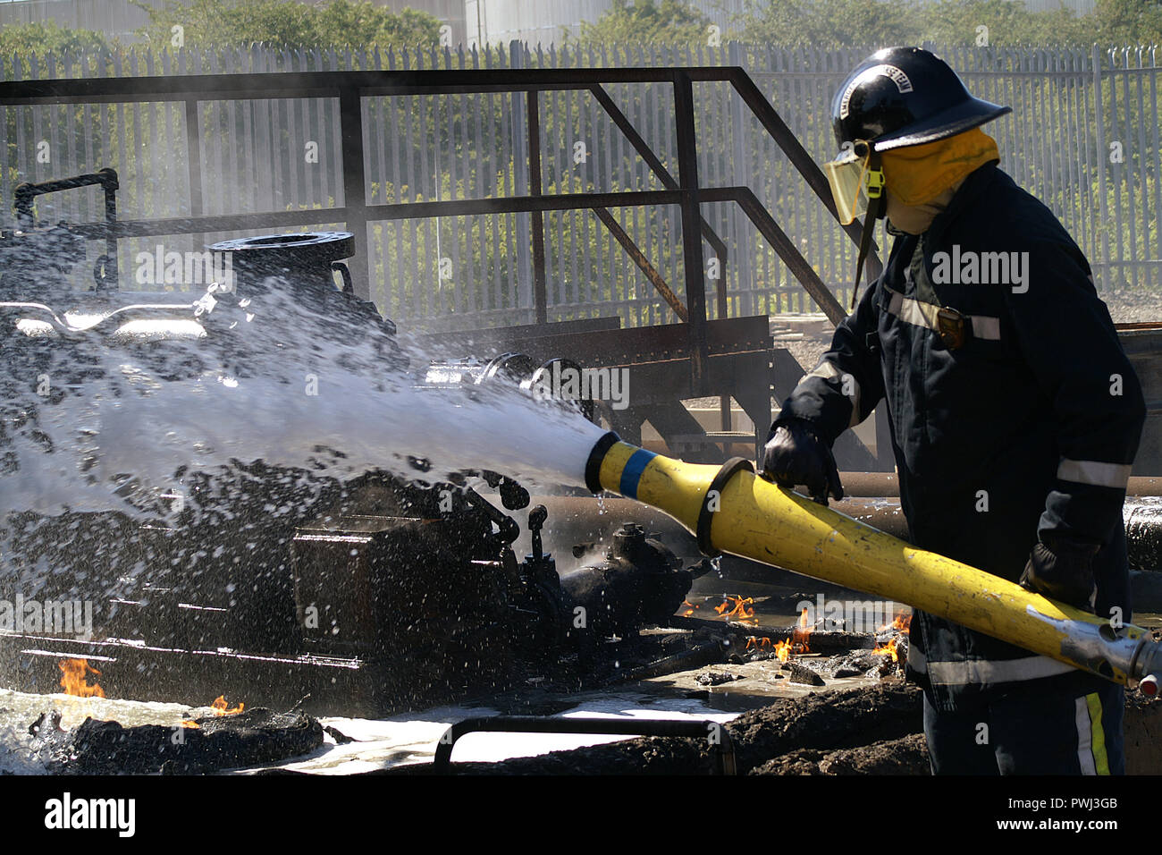 Chemical tank fire fighters hi-res stock photography and images - Alamy