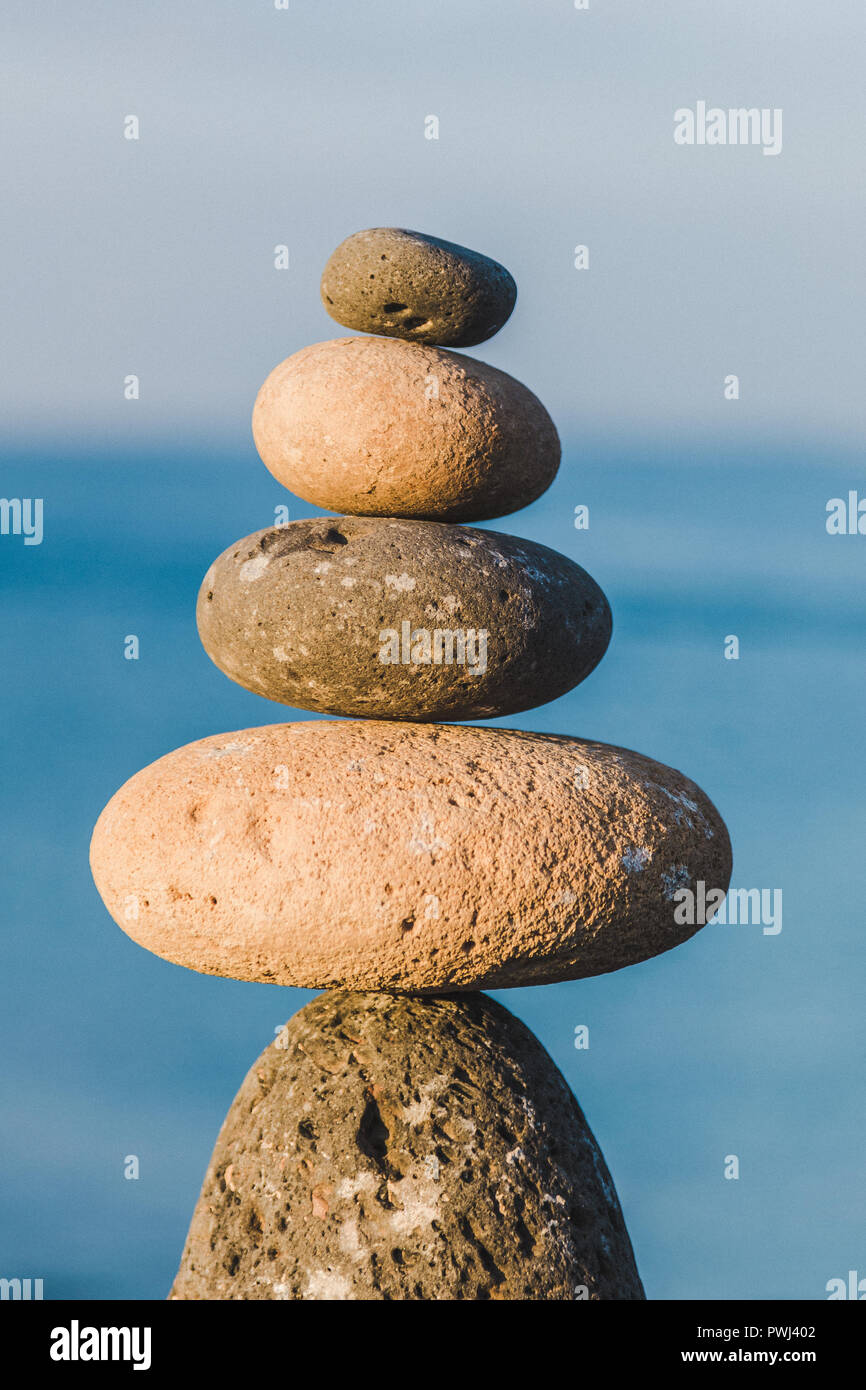 Stacked pebble tower Stock Photo - Alamy