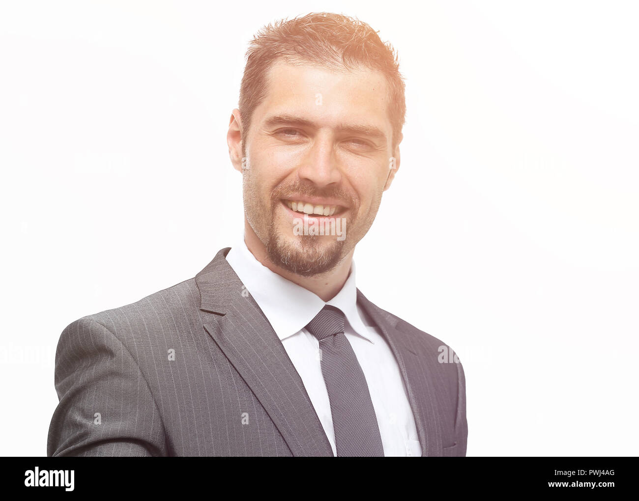 smiling businessman holds out his hand for a handshake Stock Photo - Alamy