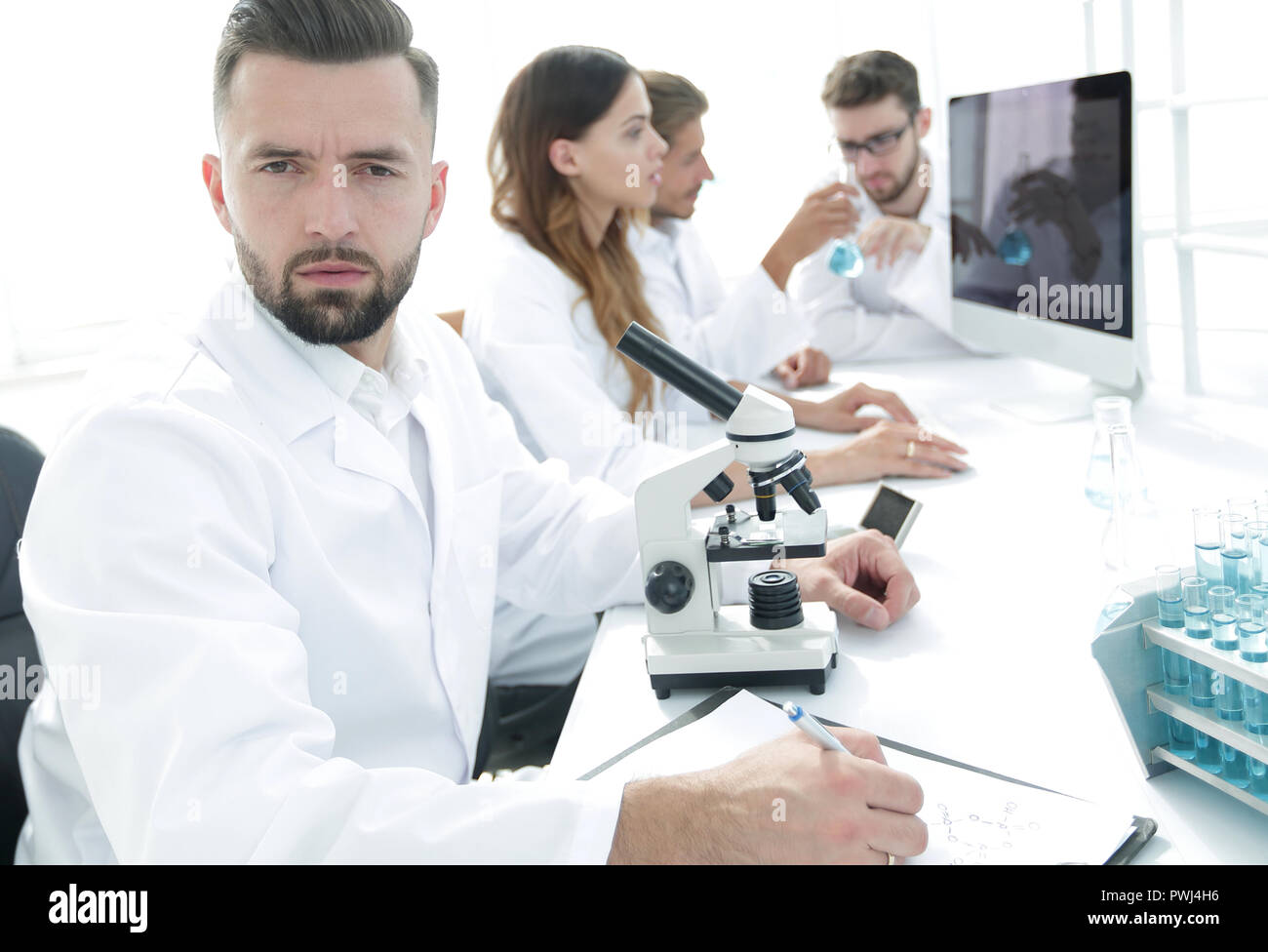 serious scientists working in the laboratory Stock Photo - Alamy
