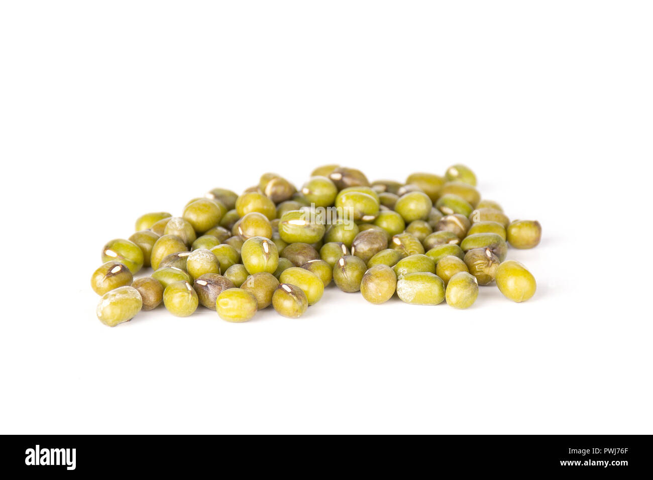Lot of whole dry green mung beans heap isolated on white background ...