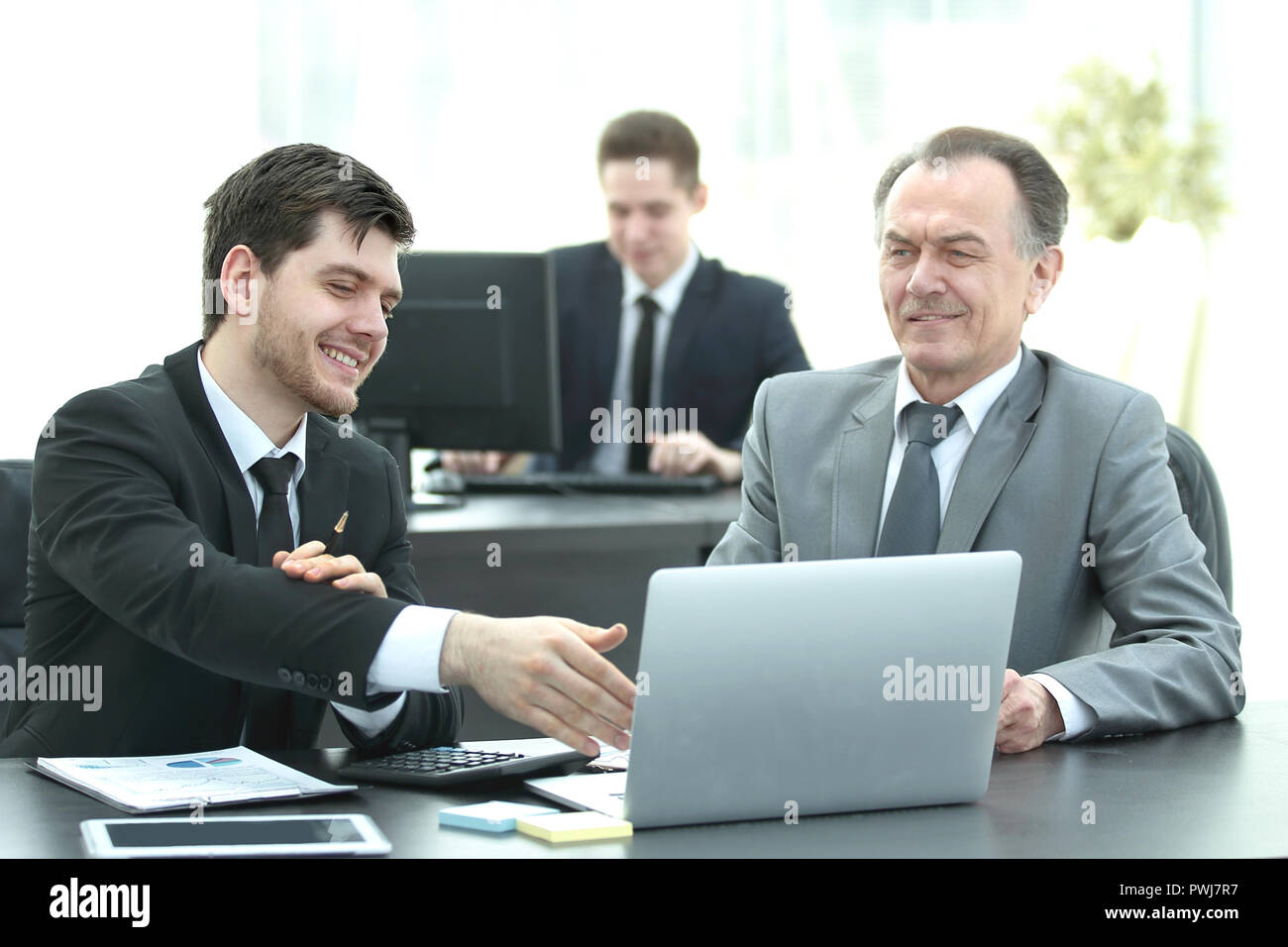employees working with financial documents in the office Stock Photo ...