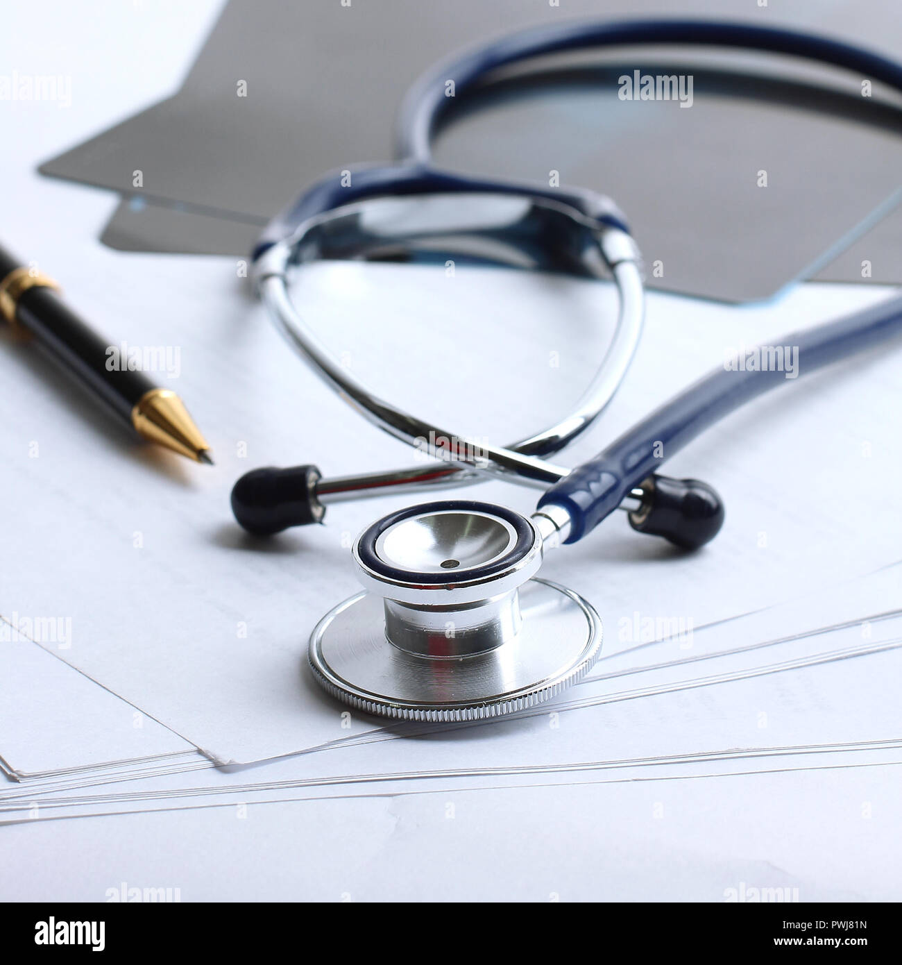stethoscope,x-ray and pen on the table. photo with copy space Stock ...