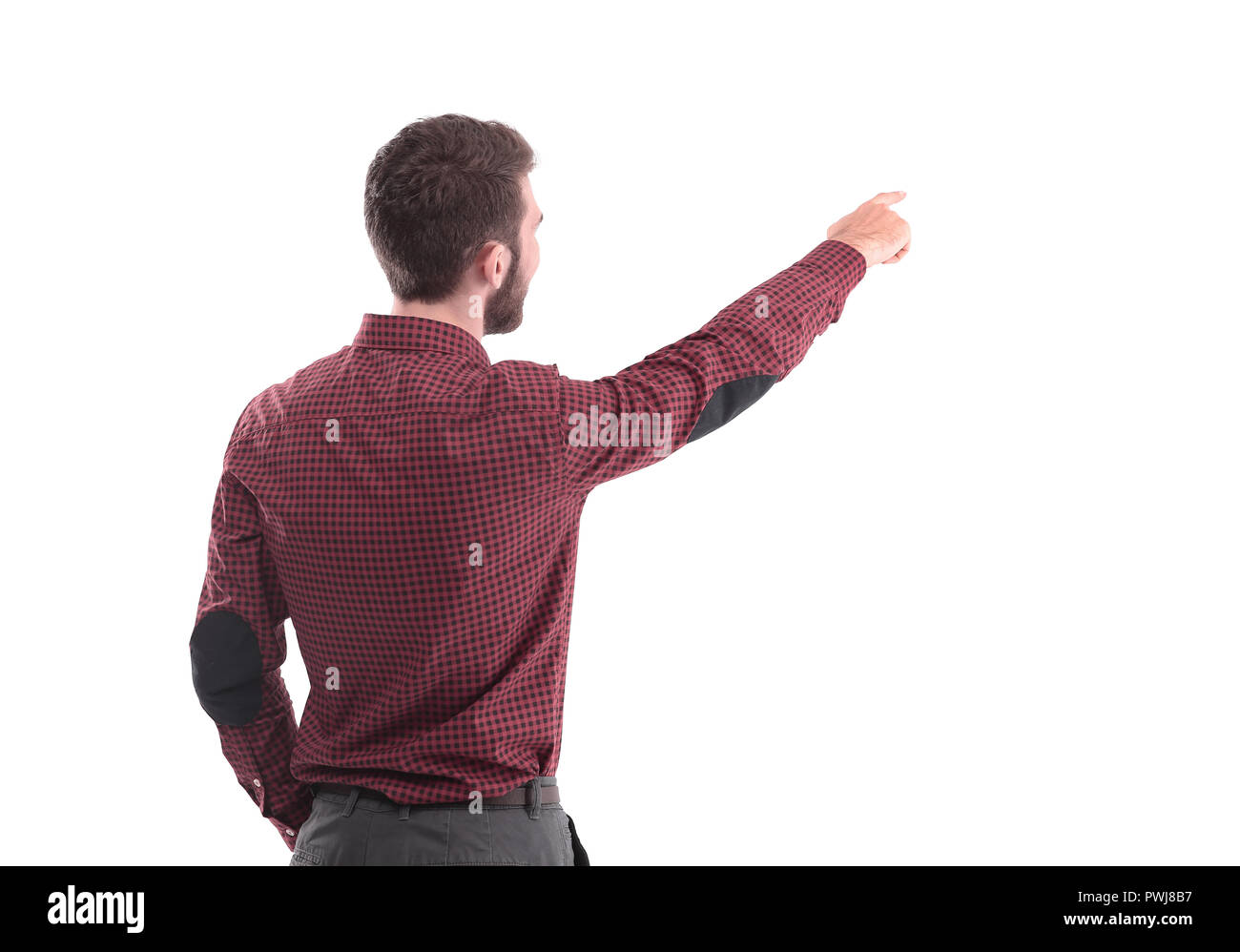 rear view.a successful employee pointing towards the copy space ...