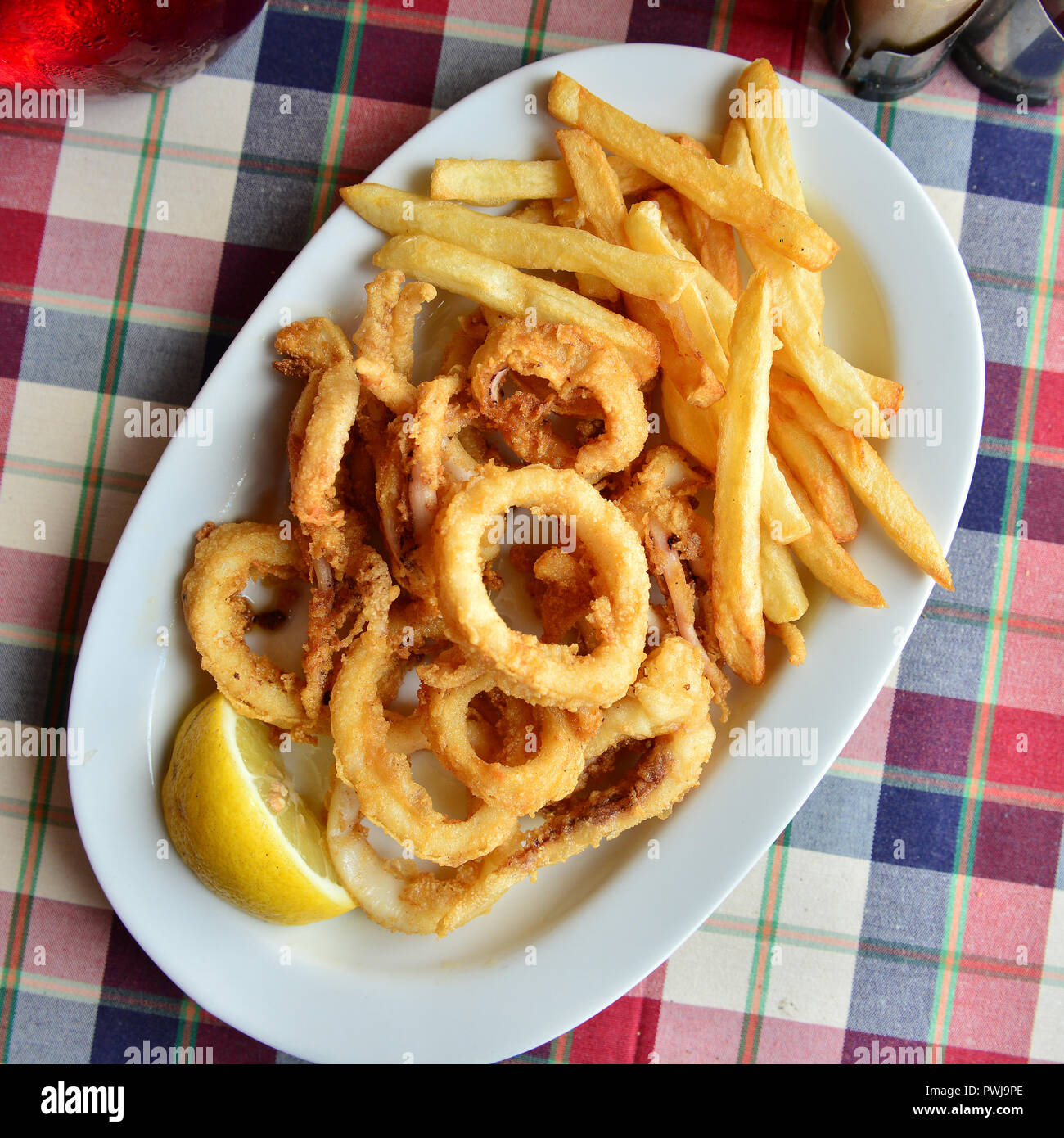 squids with fries Stock Photo - Alamy