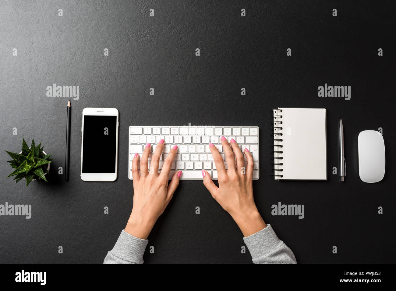 Overhead shot of woman working on computer Stock Photo - Alamy