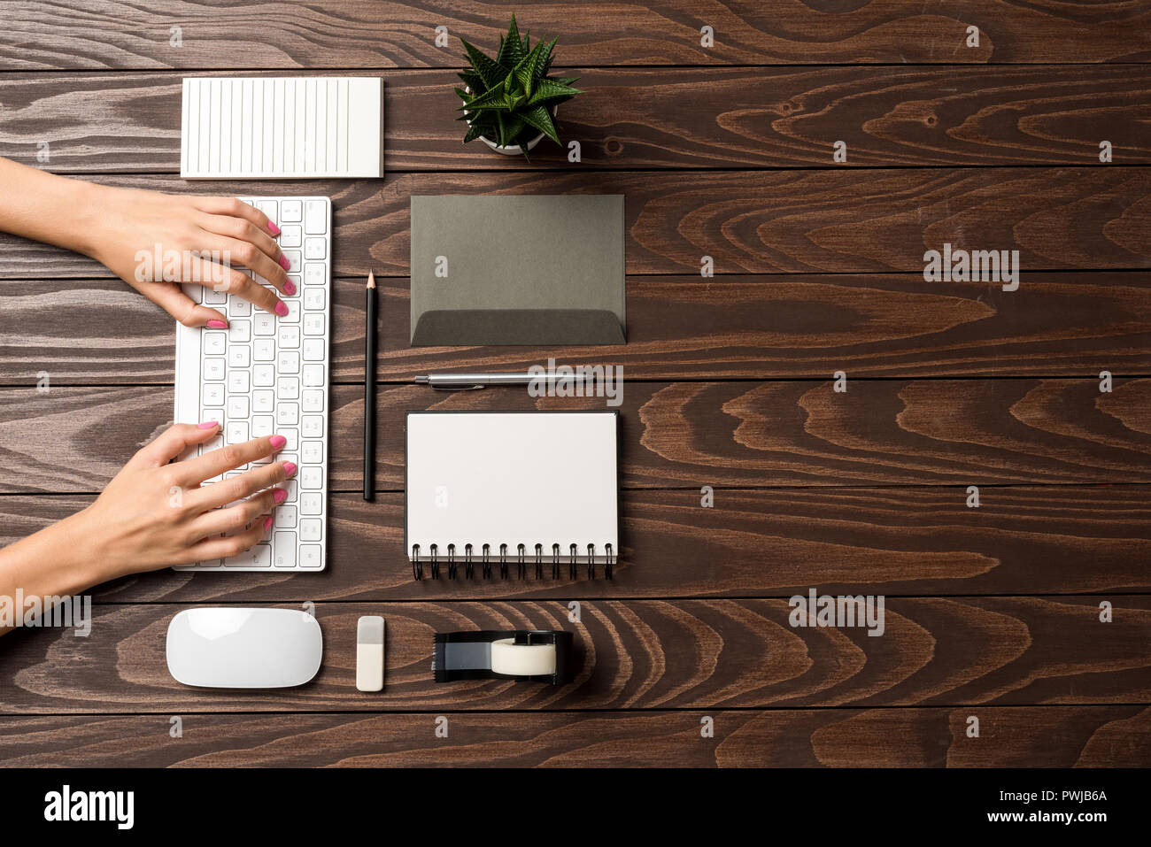 Overhead shot of office desktop Stock Photo - Alamy