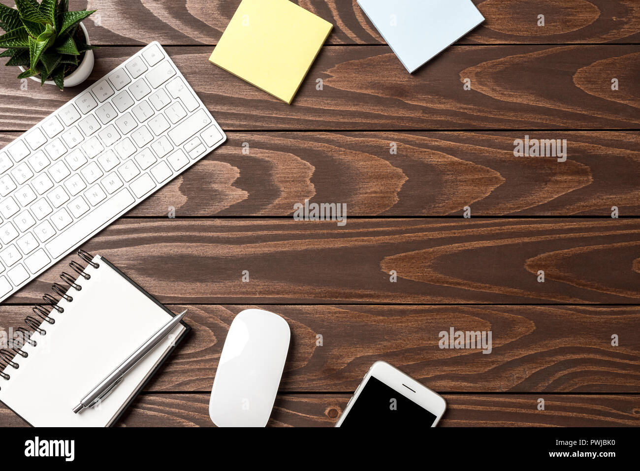 Overhead shot of office desktop Stock Photo - Alamy