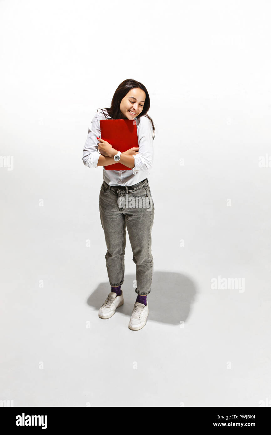 Businesswoman hugging laptop. Love to computer concept. Attractive ...