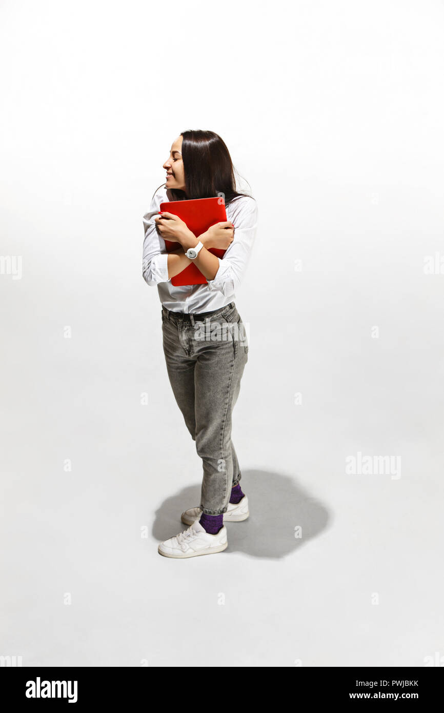 Businesswoman hugging laptop. Love to computer concept. Attractive ...