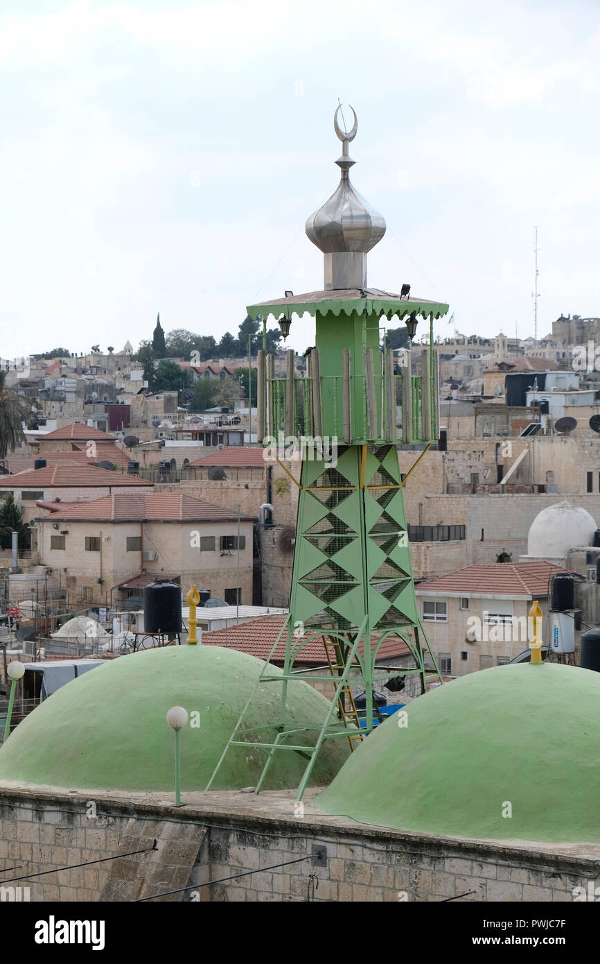 The green painted minaret of Al-Zawiya al-Qadiriyya also called Al ...
