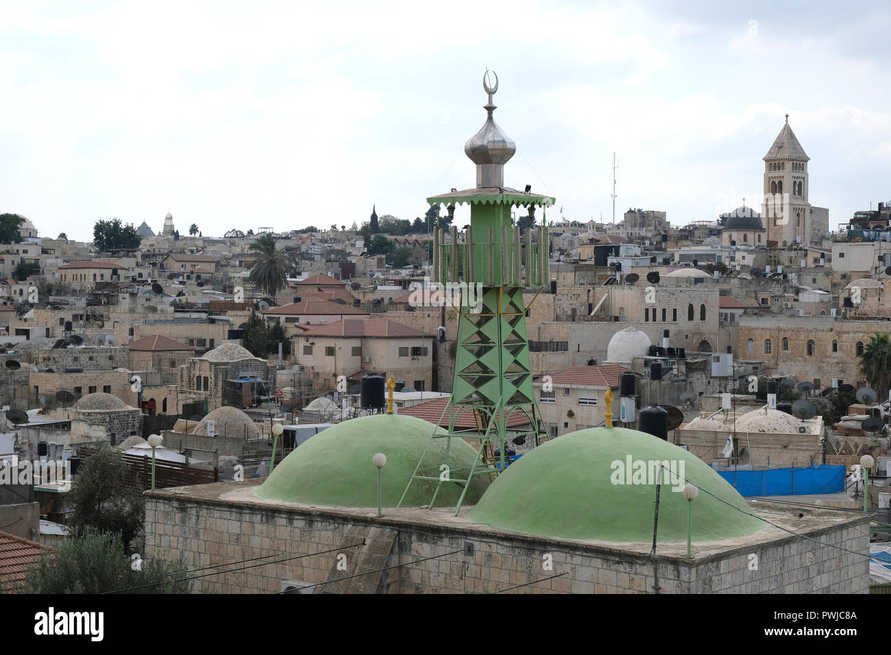 The green painted minaret of Al-Zawiya al-Qadiriyya also called Al ...