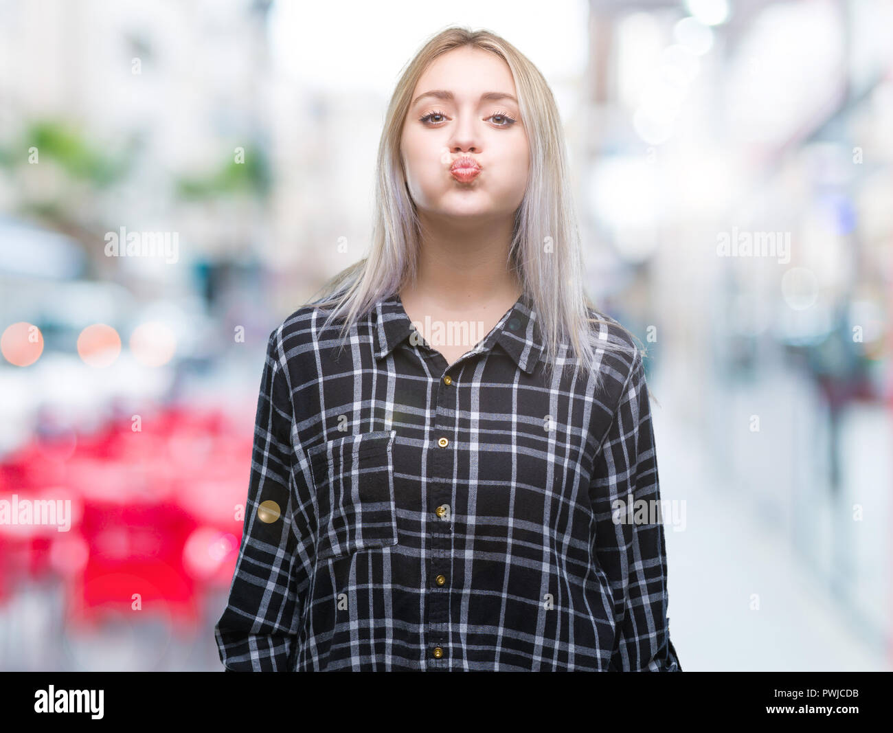 Puffed cheeks woman hi-res stock photography and images - Alamy