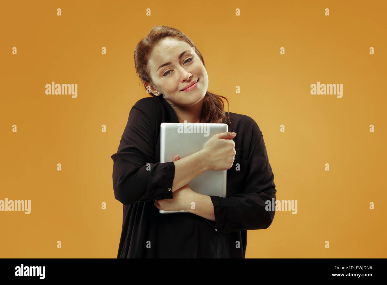 Businesswoman hugging laptop. Love to computer concept. Attractive ...