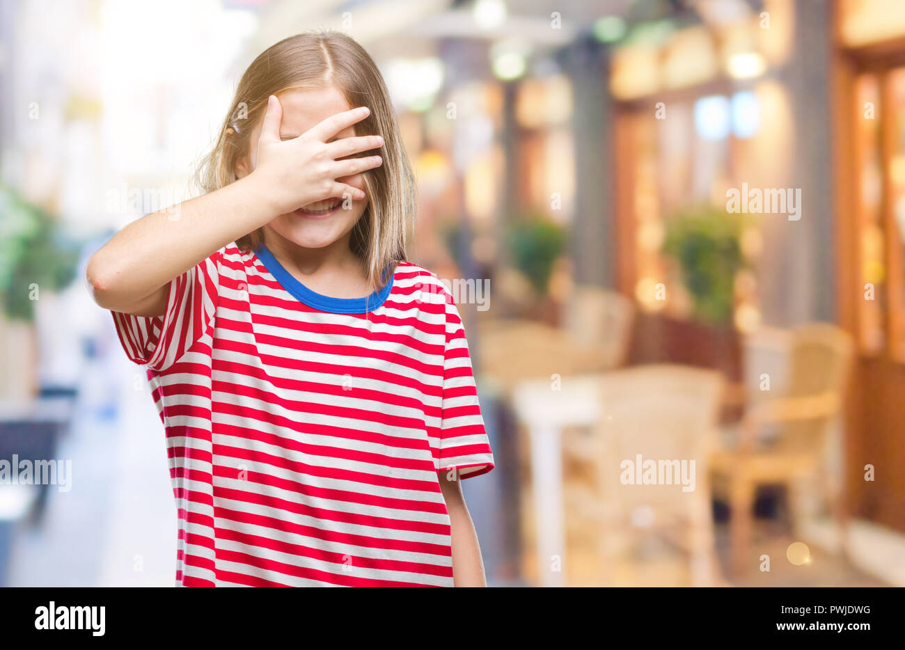 Young beautiful girl over isolated background smiling and laughing with ...