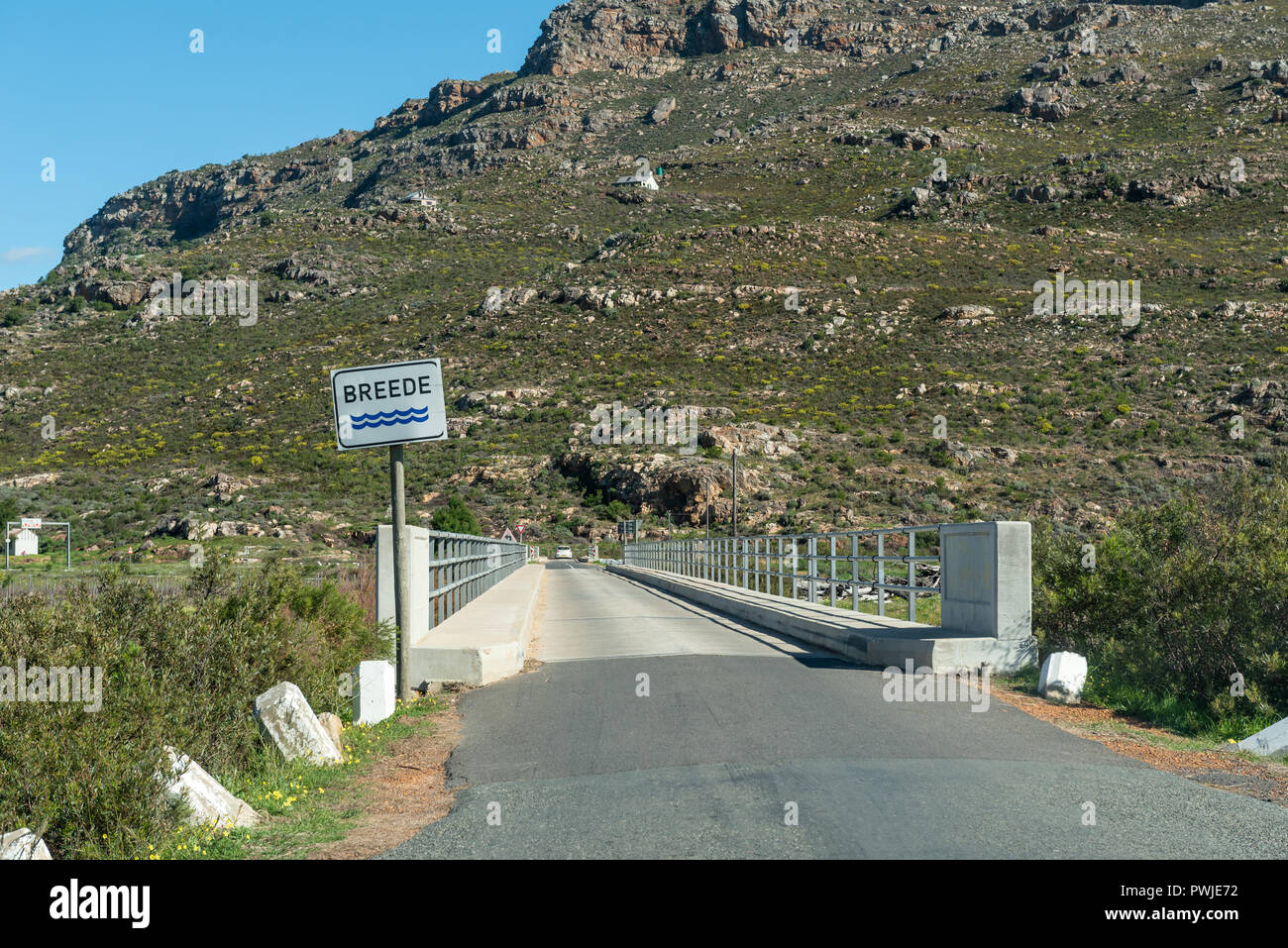 Single lane road bridge over the Breede River at the start of the Bains ...