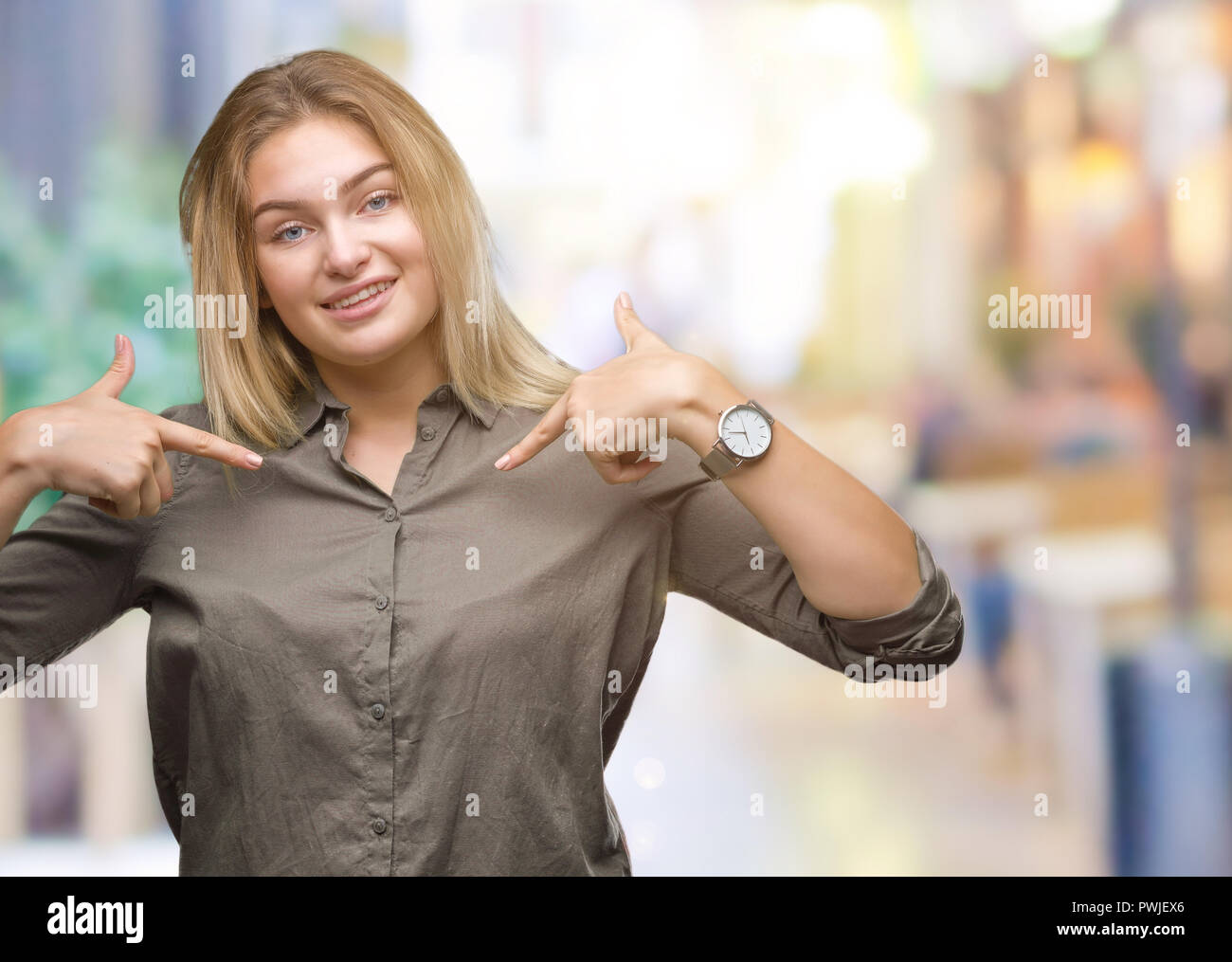 Young caucasian business woman over isolated background looking ...