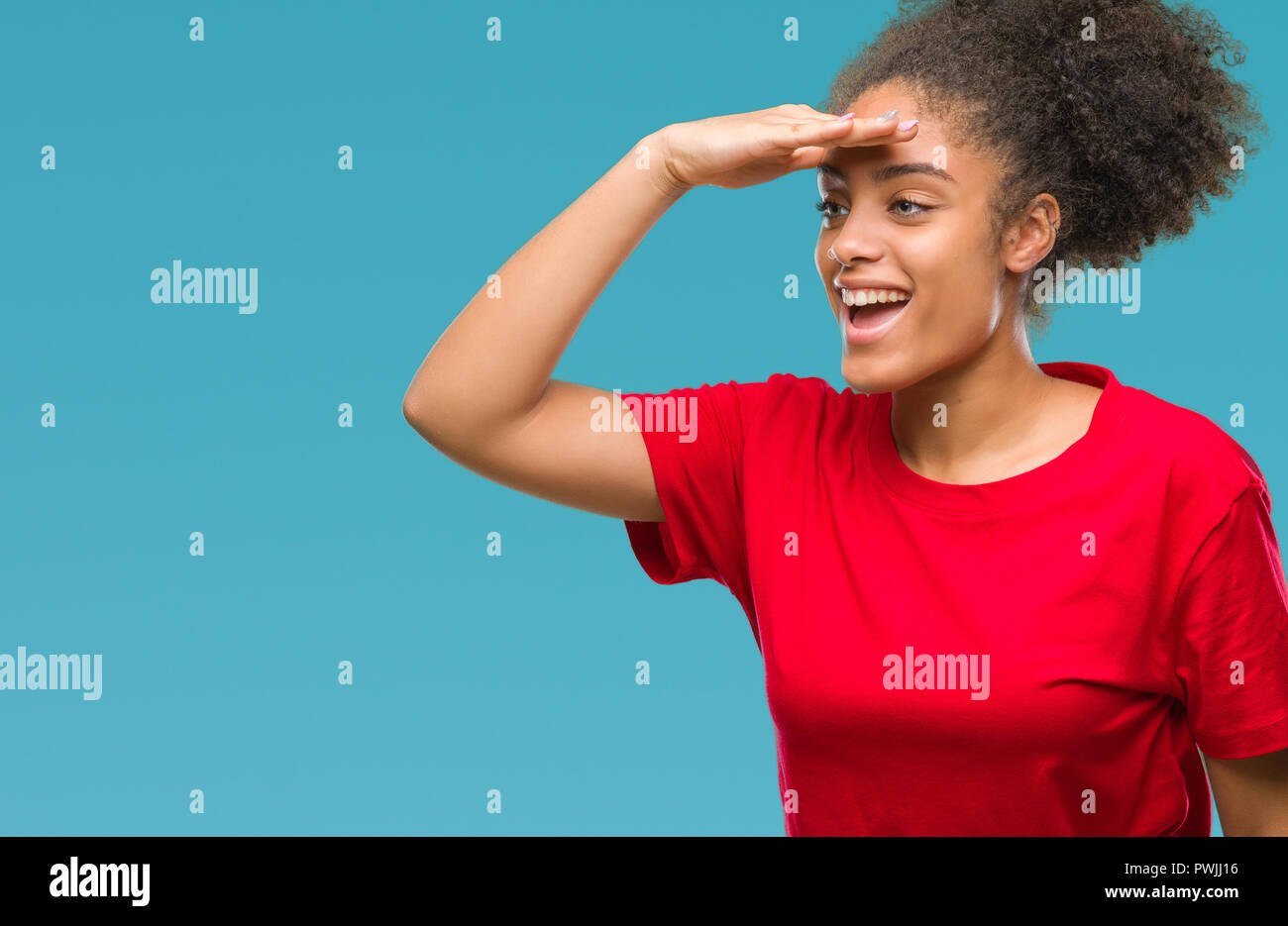 Young afro american woman over isolated background very happy and ...