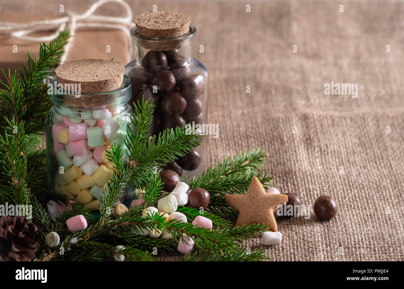 Christmas sweets context with colorful mini marshmallows and chocolate ...