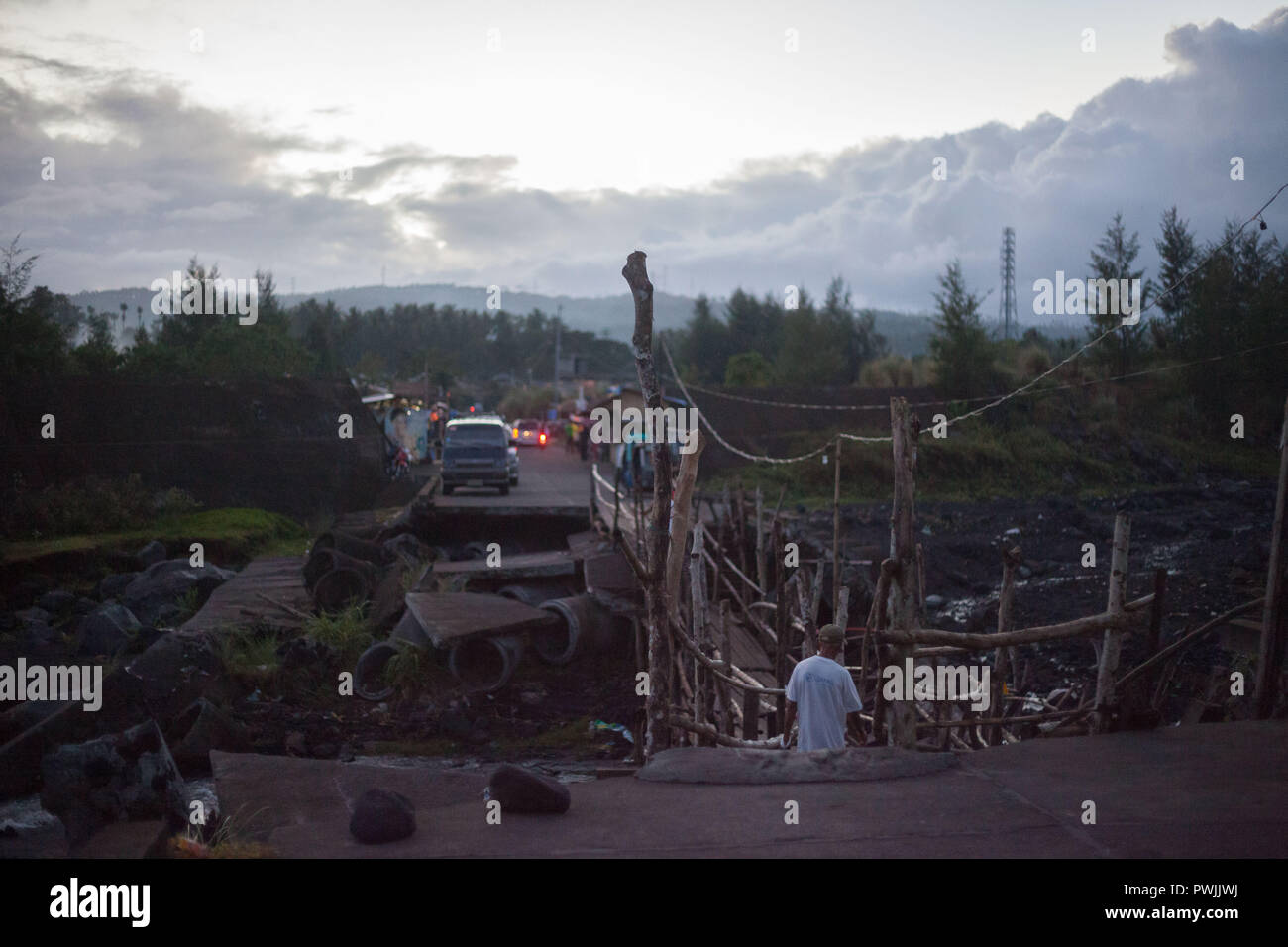 A broken bridge near the foot of Mayon Volcano, Bicol, Philippines ...