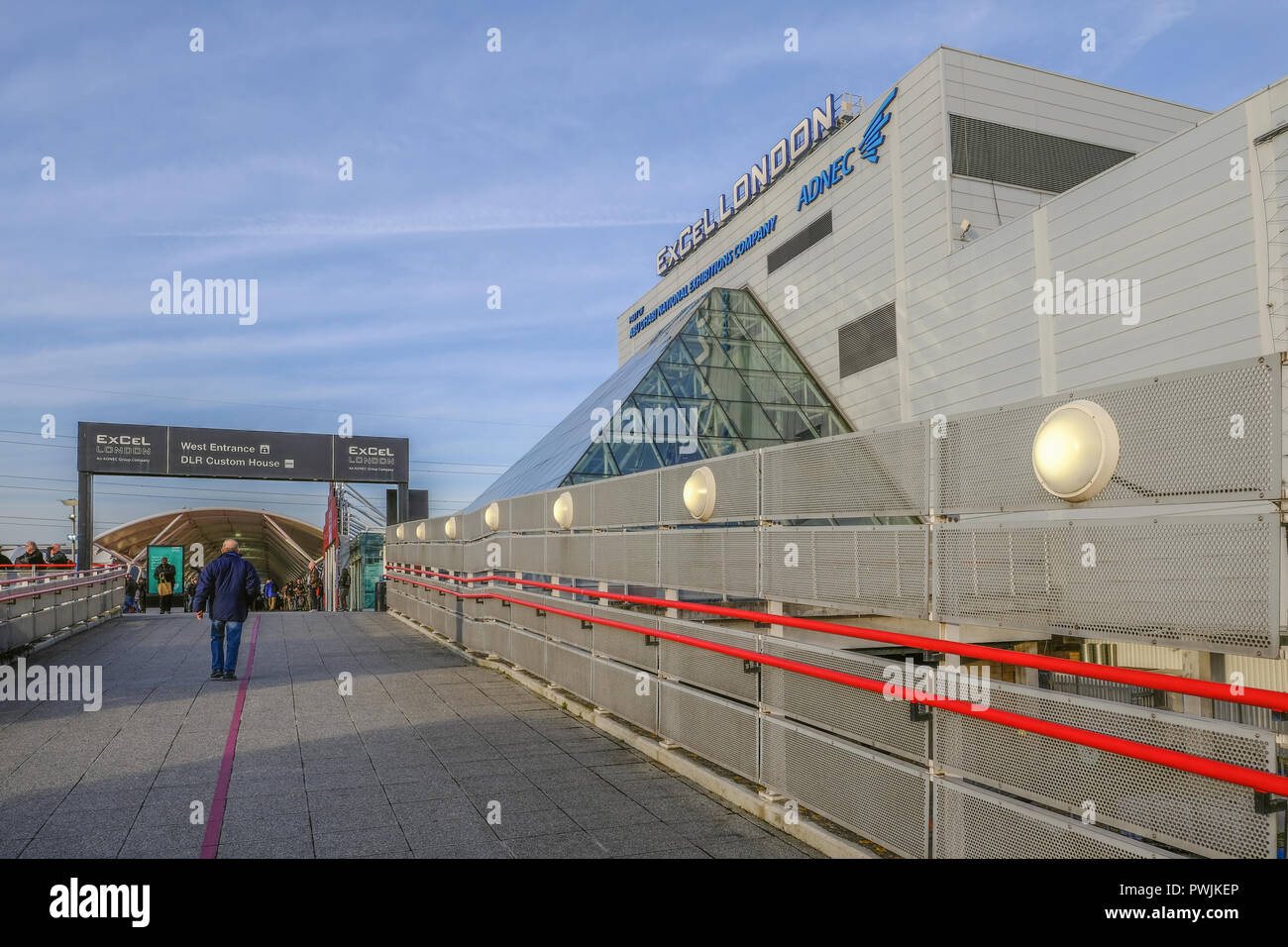 Royal Dock, Custom House, London, UK - February 14, 2018: Man walking ...