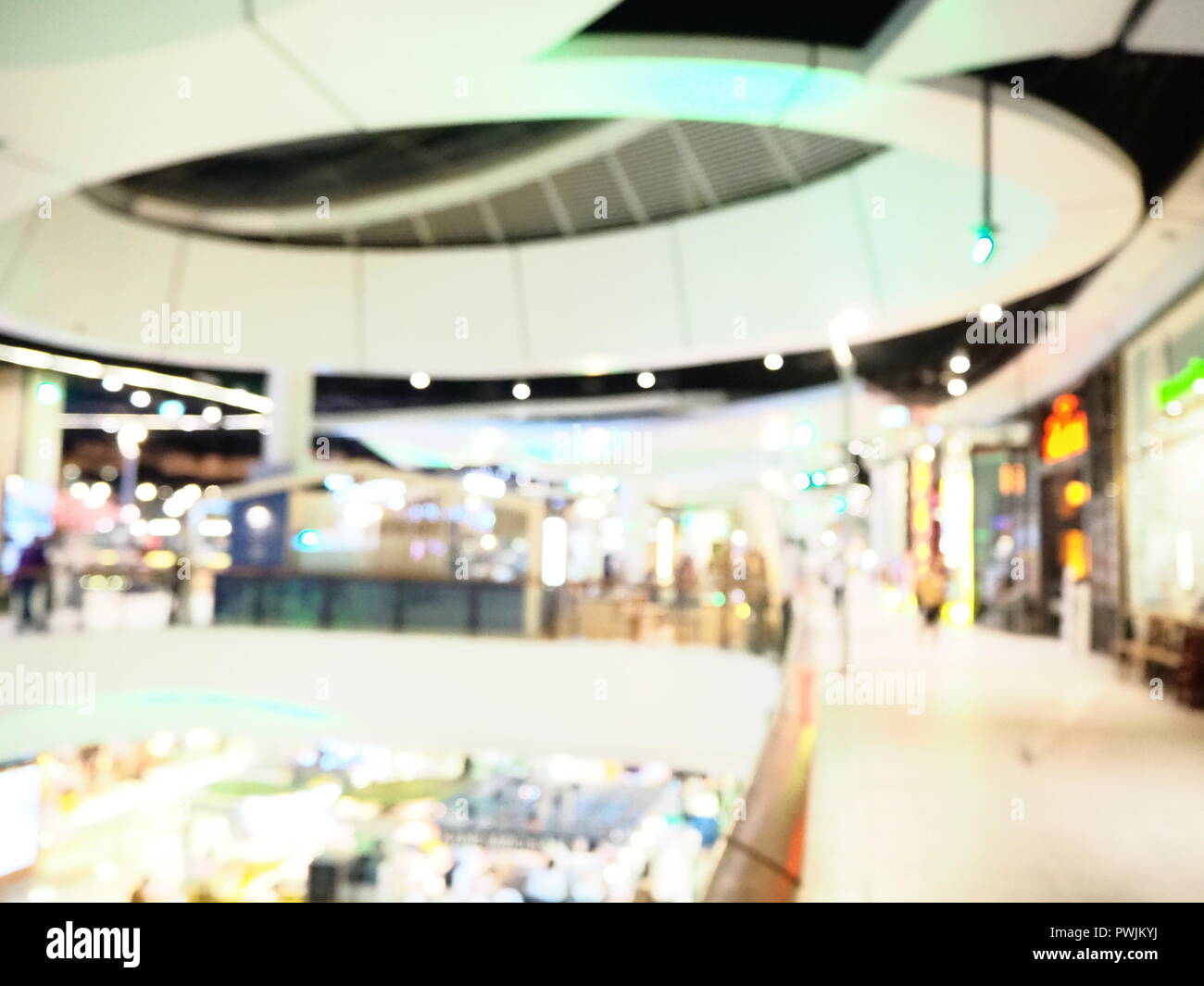 Blurred interior of shopping mall. The modern building concept Stock ...