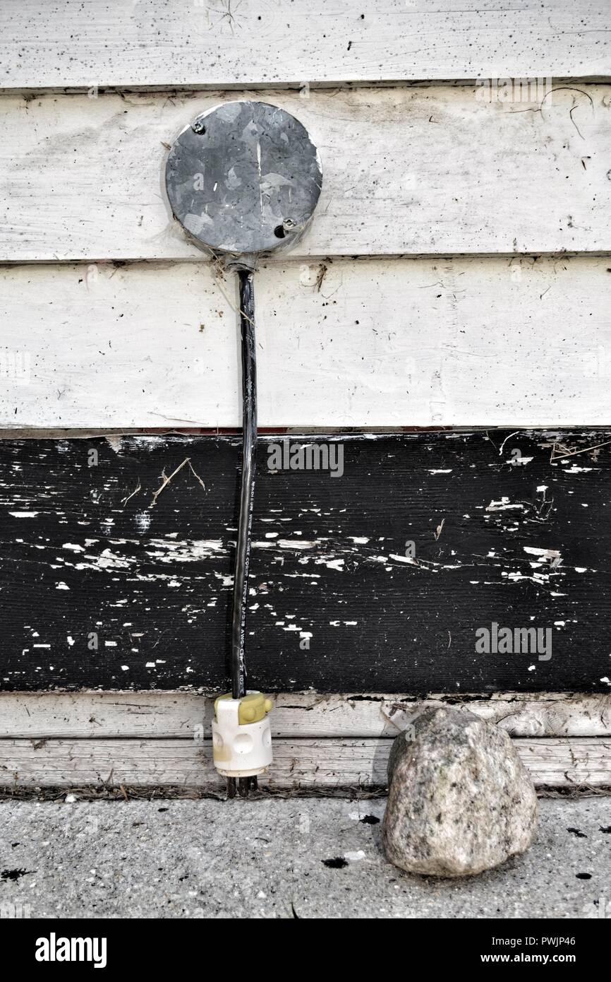 Electrical plug on old railway building Stock Photo - Alamy