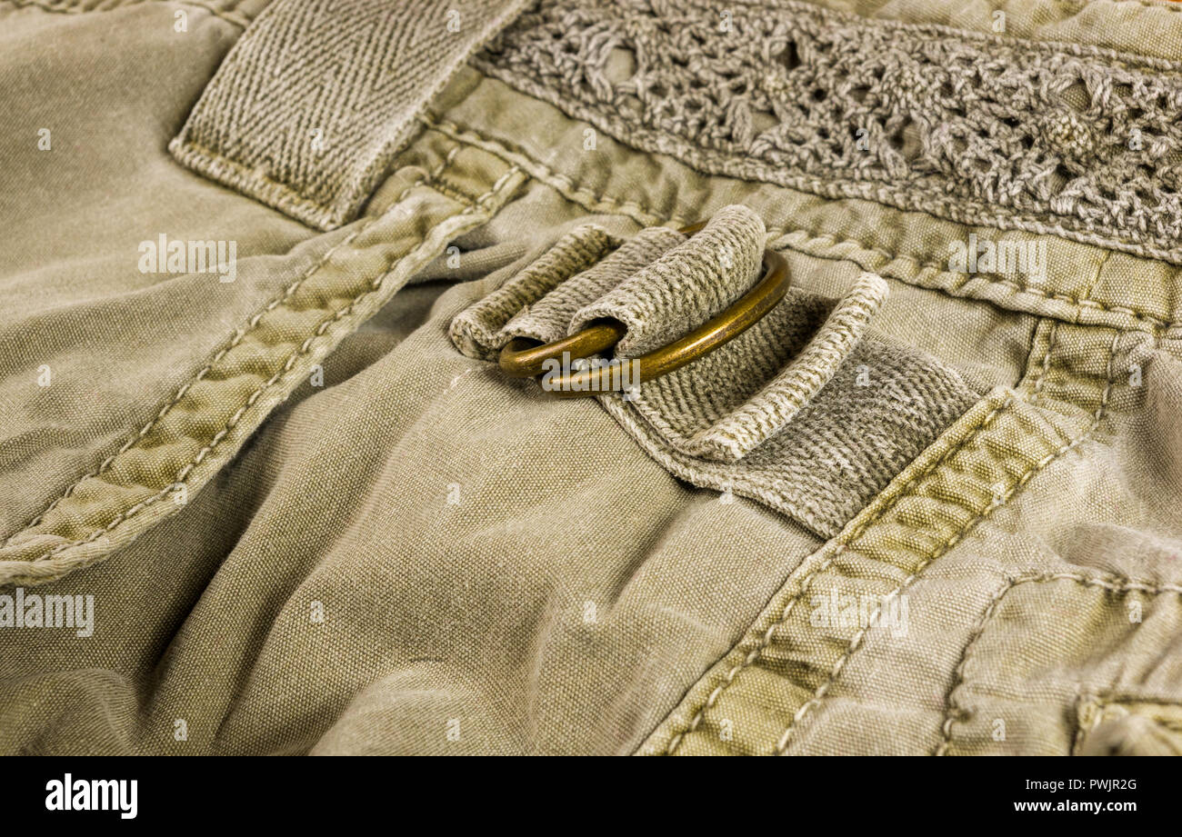 clothing items washed cotton fabric texture with seams, clasps, buttons ...