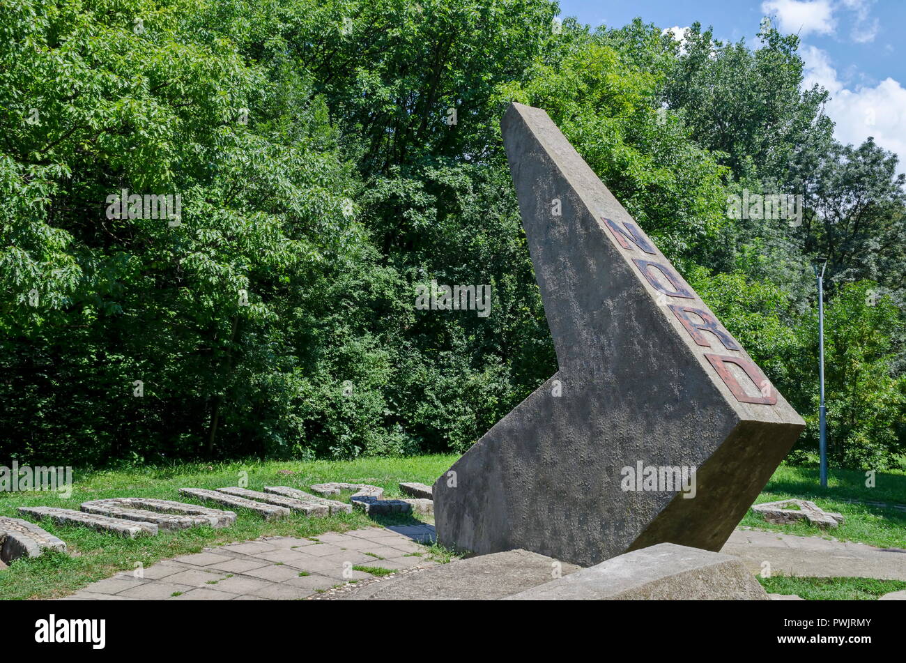 Fragment of abandoned Sun clock dial in the old North park with shadow ...