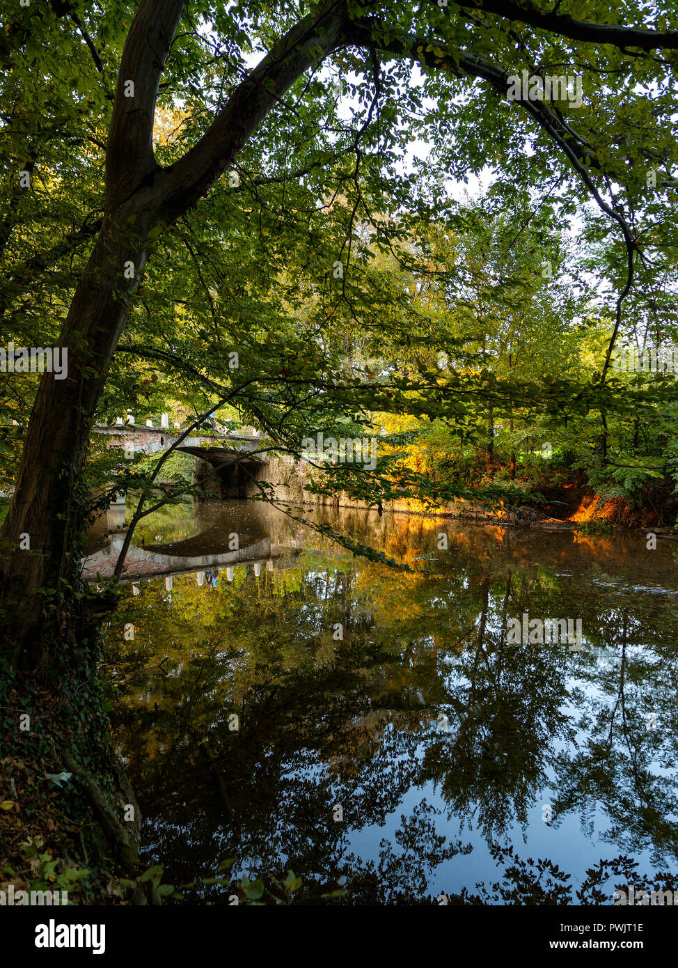 Ancient bridge of chains over lambro river in monza, shot in autumn ...