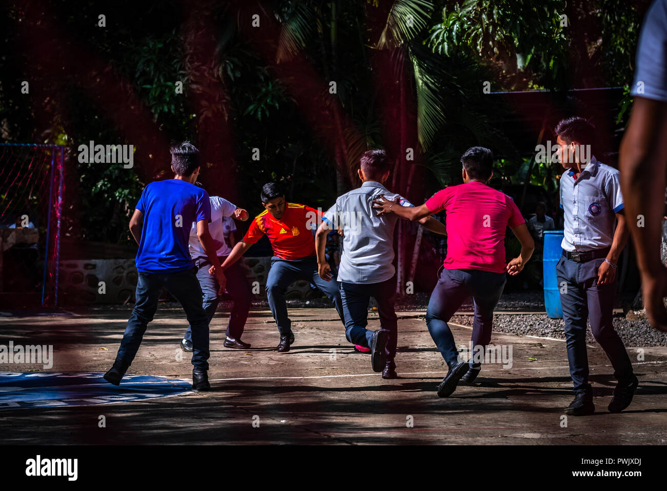 guatemalan kids playing soccer at recess at guatemalan college Stock ...