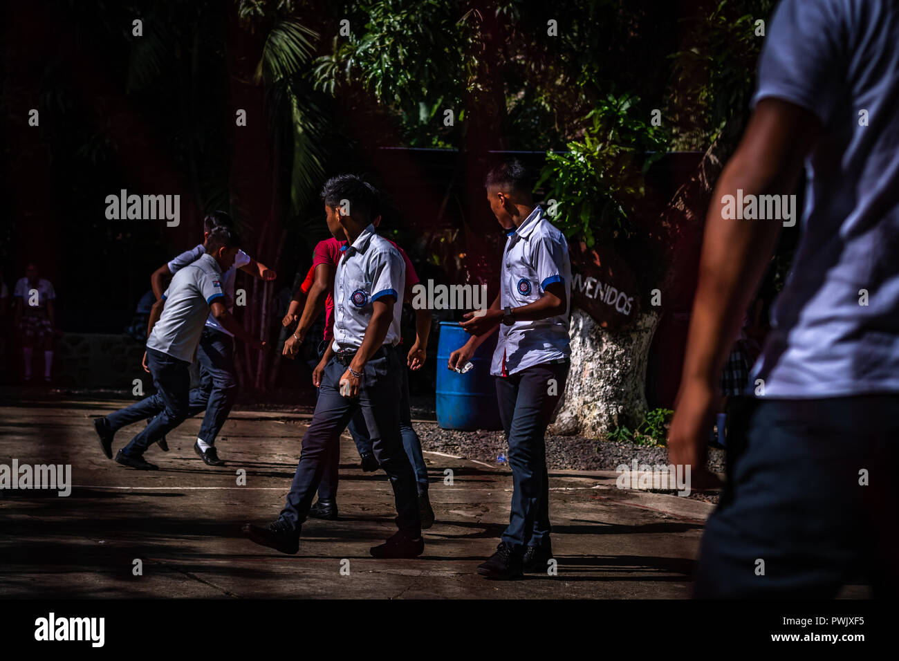 guatemalan kids playing soccer at recess at guatemalan college Stock ...