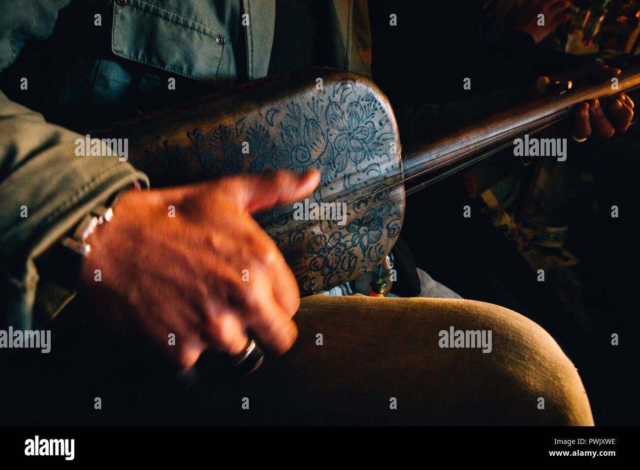 Man Strumming a Sintir aka Guembri, Chefchaouen, Morocco, 2018 Stock ...