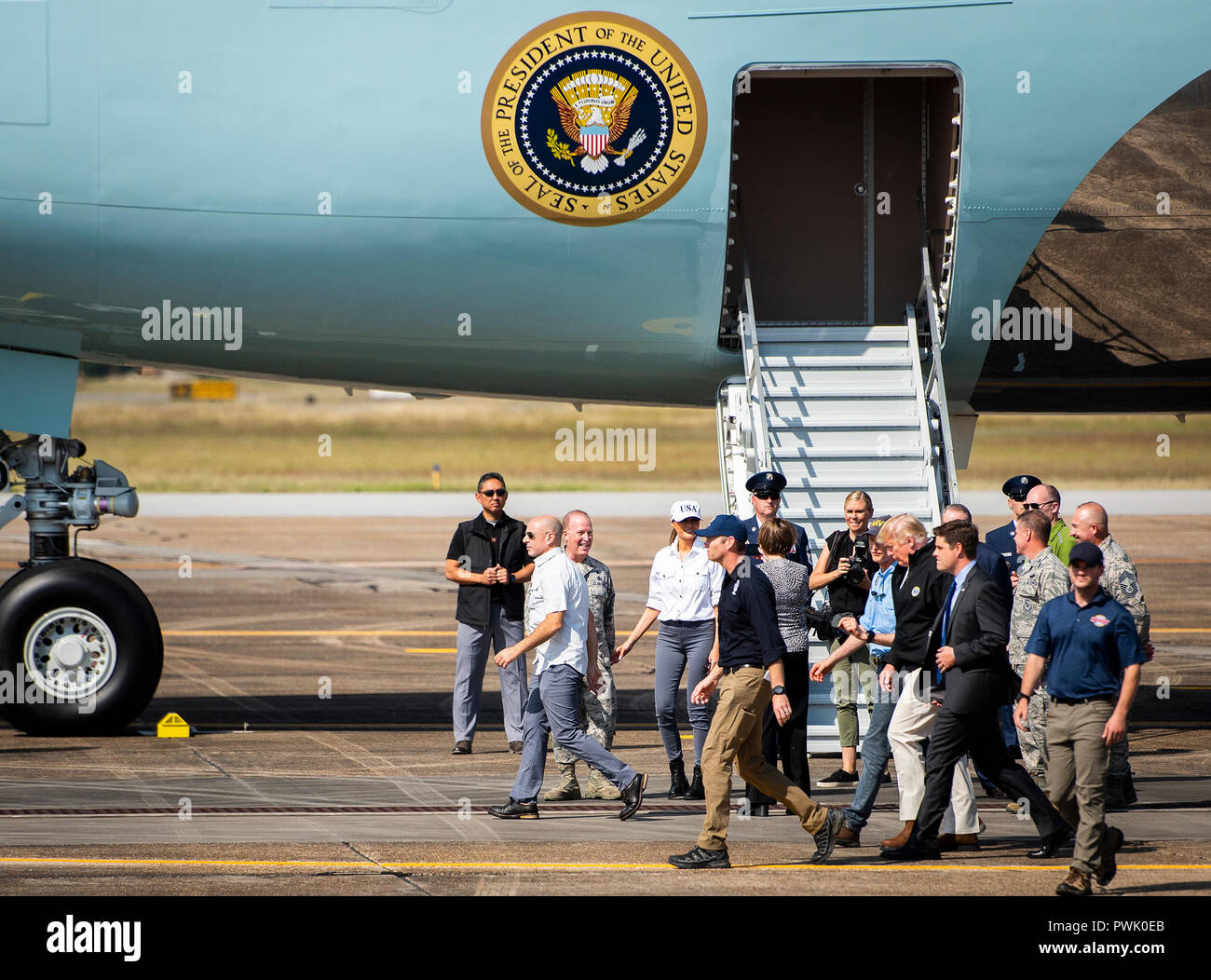 President Donald J. Trump walks with Florida leadership toward his ...
