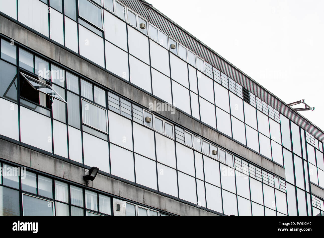 Run down and unused office building exterior Stock Photo - Alamy