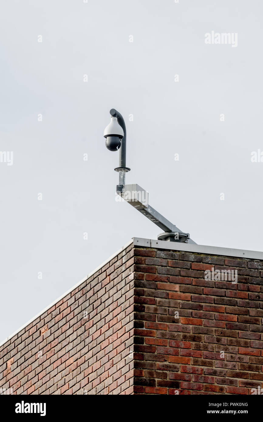 Security camera mounted on a building for cctv recording Stock Photo ...