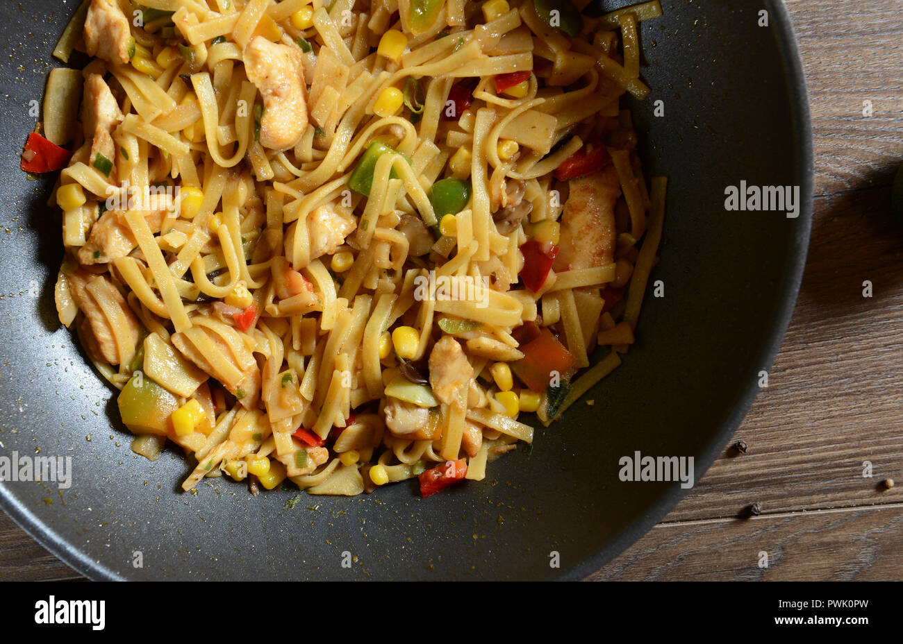 Traditional indonesian meal bami goreng with noodles, vegetables and ...