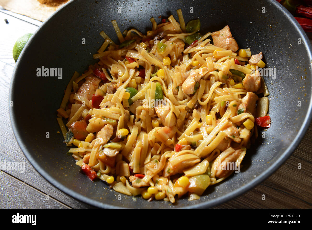 Traditional indonesian meal bami goreng with noodles, vegetables and ...