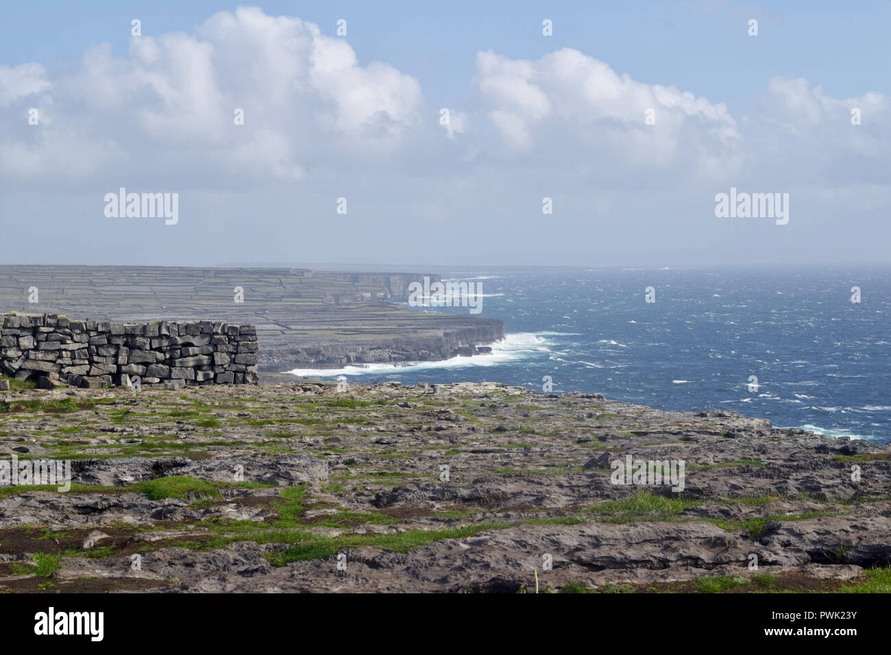 Beautiful view of the cliffs on Inis Mór (Inishmore) from inside the ancient fort of Dún ...