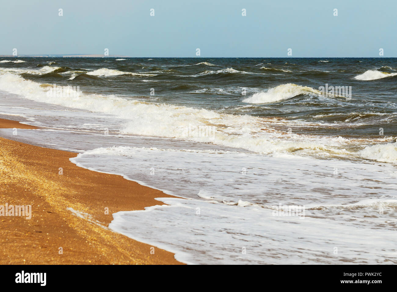 Coast of Azov Sea with storm waves Stock Photo - Alamy