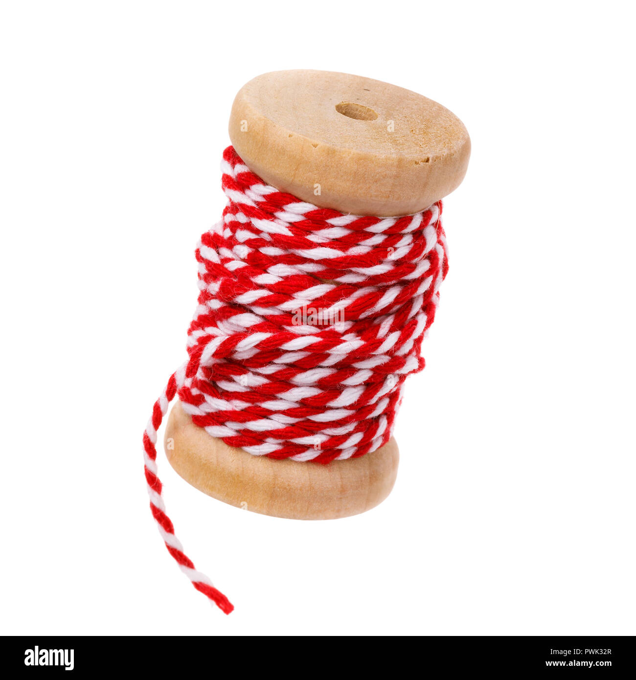Red thread reel isolated on white background Stock Photo - Alamy