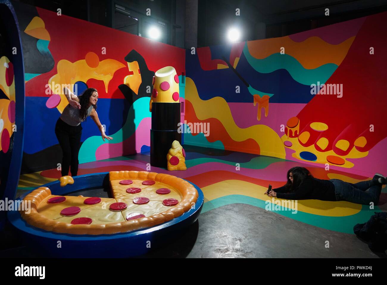 New York, USA. 16th Oct, 2018. Visitors take pictures at the Museum of ...