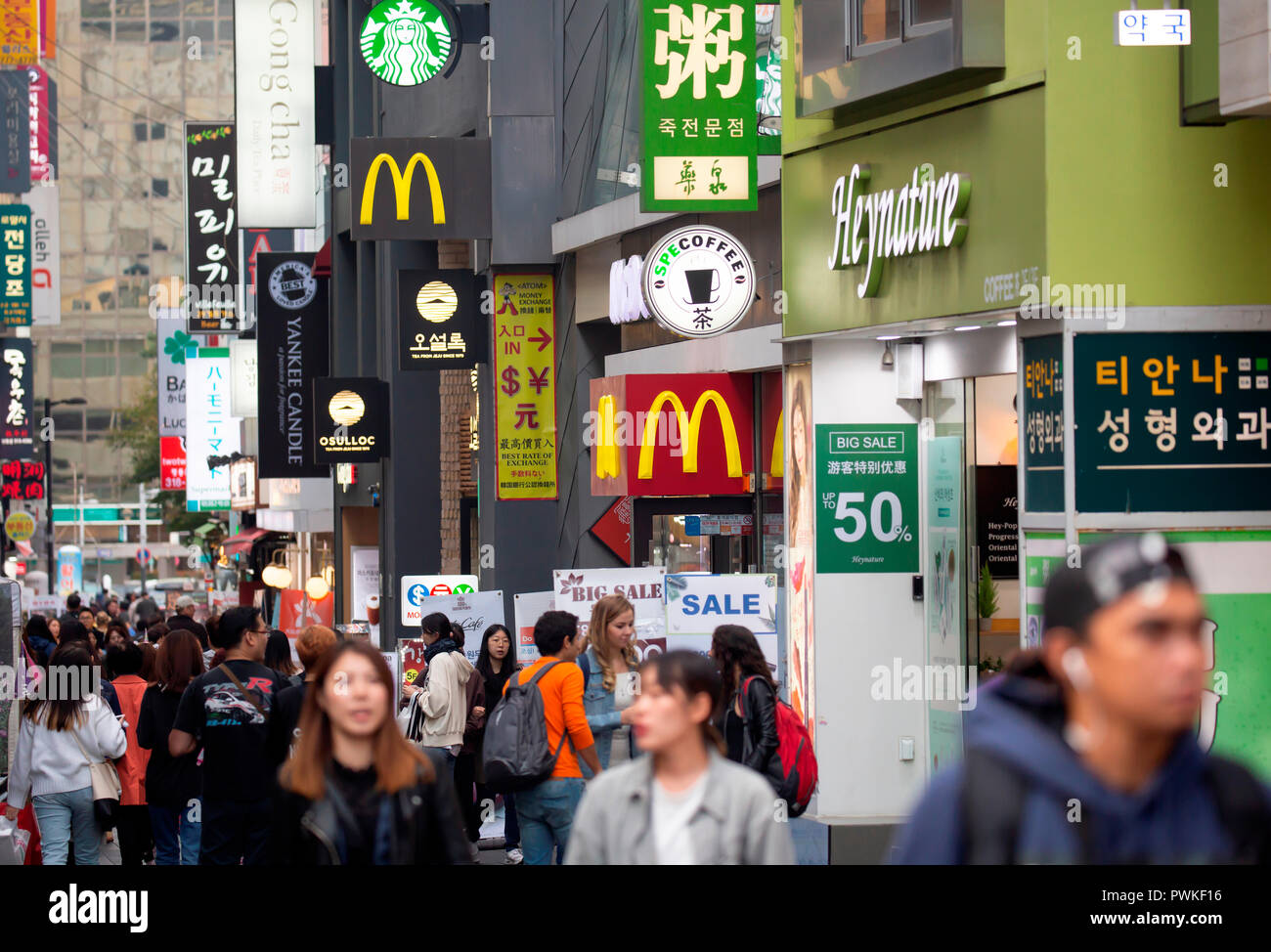 Myeongdong street, Oct 14, 2018 : People walk as street signboards and ...