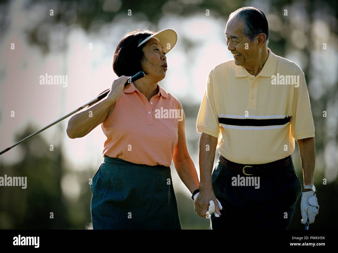 Together husband wife golf hi-res stock photography and images - Alamy