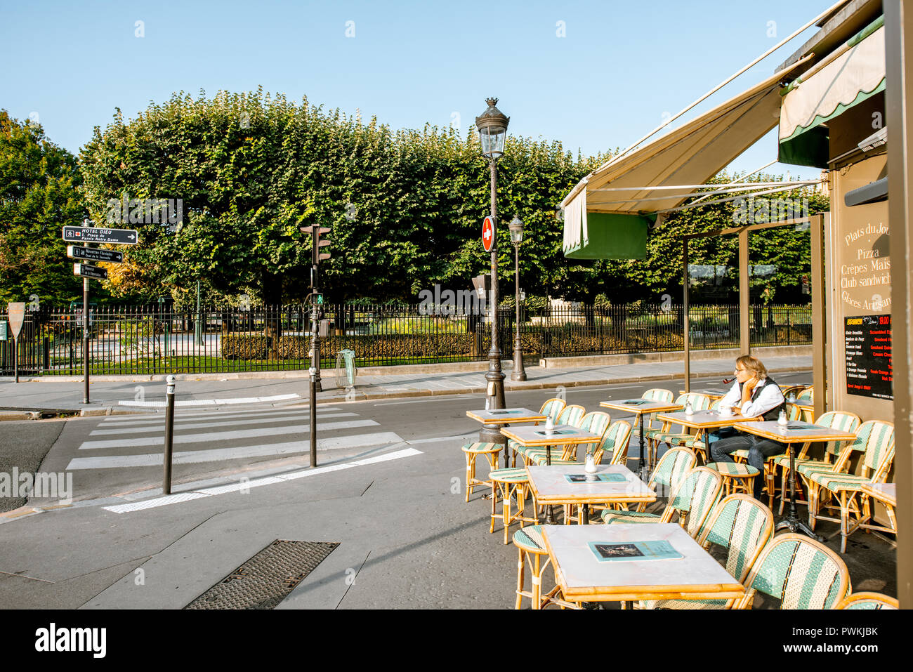 PARIS, FRANCE - August 31, 2018: Street view with french cafe and Notre ...