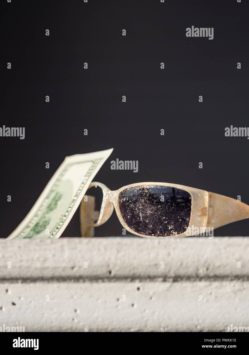 Money thrown away hi-res stock photography and images - Alamy