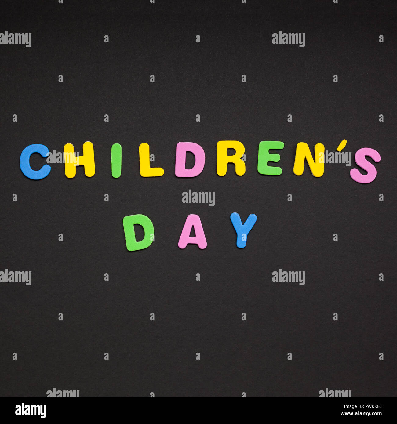 Creative colorful text made from plastic letters Children's day writing ...